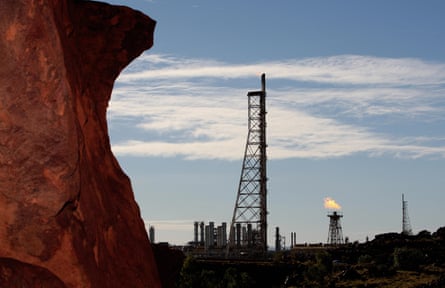 Gas flares and red rock at Woodside’s North West Shelf gas project on the Burrup peninsula