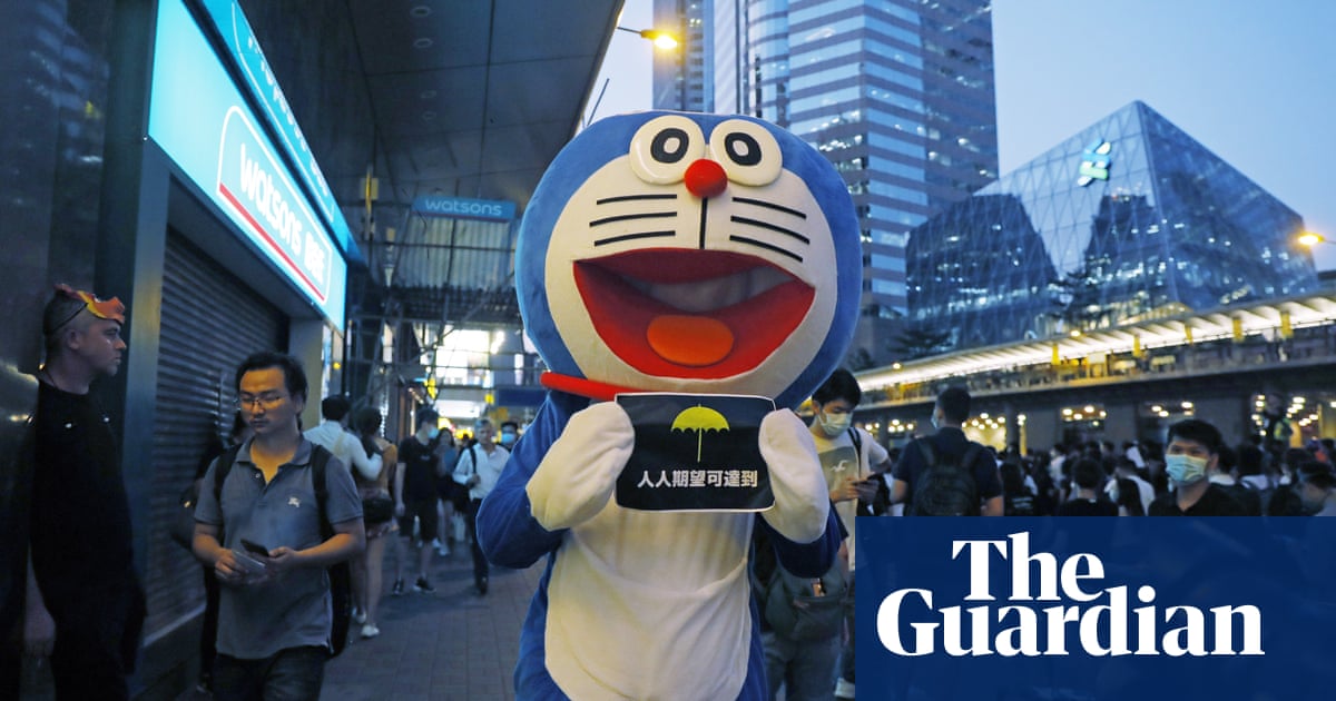 Hong Kong Protesters Defy The Mask Ban In Pictures World News The