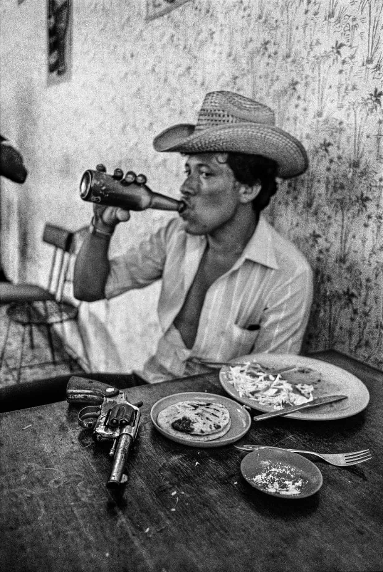 A Death Squad Mercenary Stops For Lunch In El Salvador 1980s a-death-squad-mercenary-stops-for-lunch-in-el-salvador-1980s