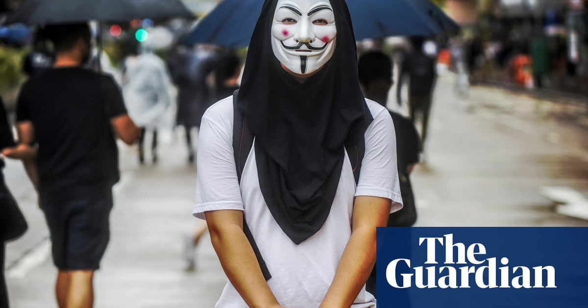 Hong Kong Protesters Defy The Mask Ban In Pictures World News The