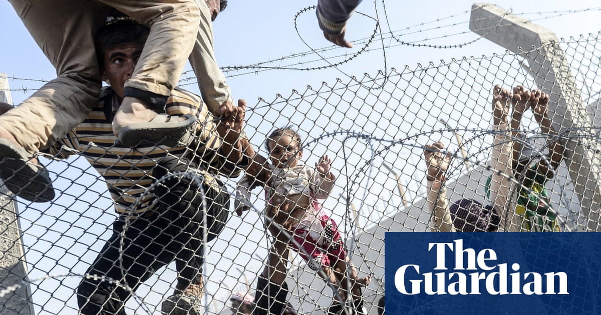 Syrian Refugees Cross Into Turkey In Pictures World News The Guardian