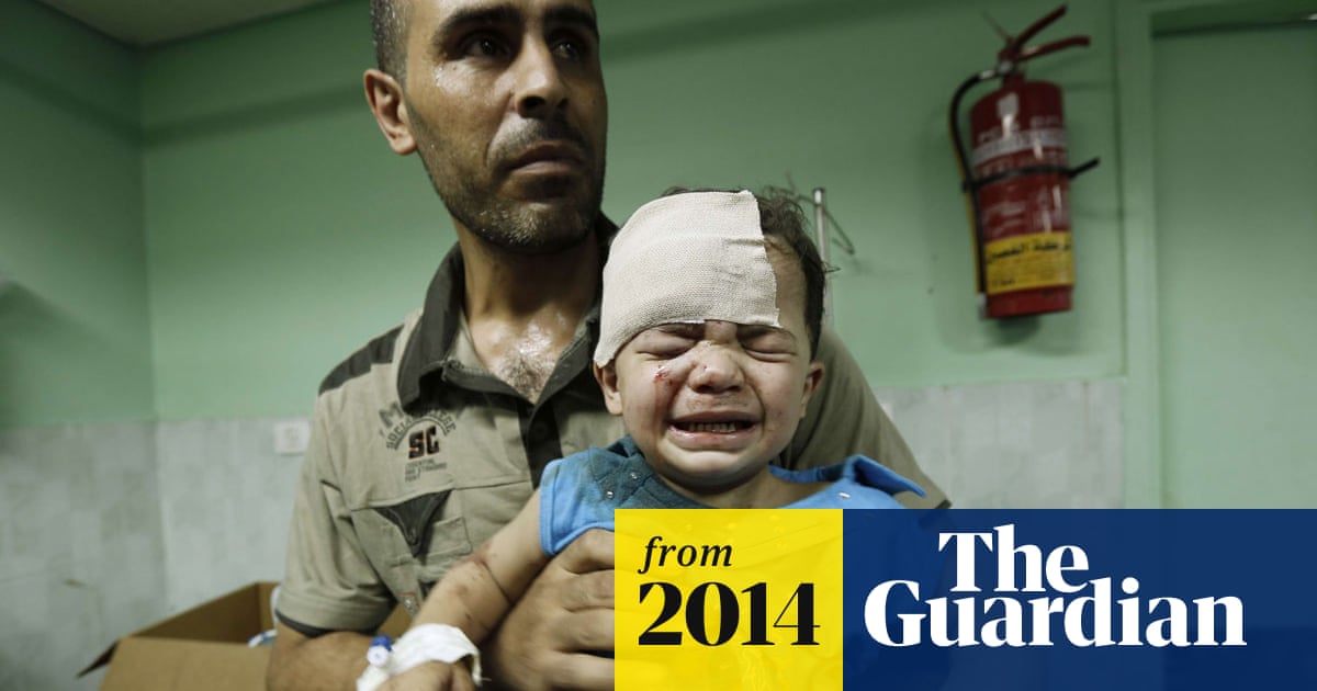 Palestinians Mourn Loved Ones Killed In Israeli Attack On UN School palestinians-mourn-loved-ones-killed-in-israeli-attack-on-un-school